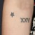 Avril Lavigne's "XXV" and Star Elbow Tattoos | Steal Her Style