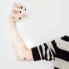 Emily Armstrong's Tattoos & Meanings | Steal Her Style