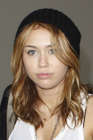 Miley Cyrus Wavy Light Brown All-Over Highlights Hairstyle | Steal Her ...