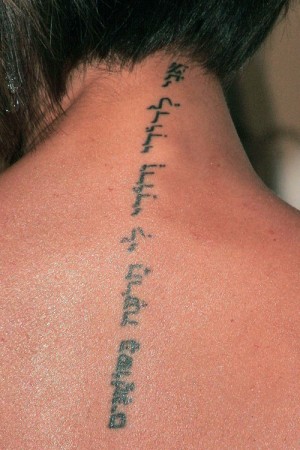 Victoria Beckham's Tattoos & Meanings | Steal Her Style