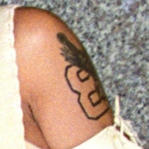 Kesha Palm Tree, Writing Upper Arm Tattoo | Steal Her Style