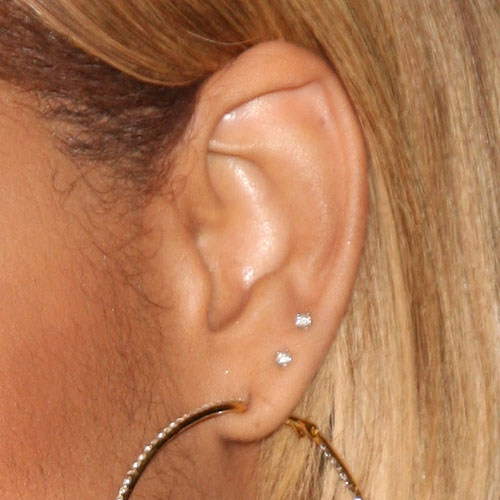 Kylie Jenner Auricle/Rim, Ear Lobe, Helix/Cartilage Piercing | Steal ...