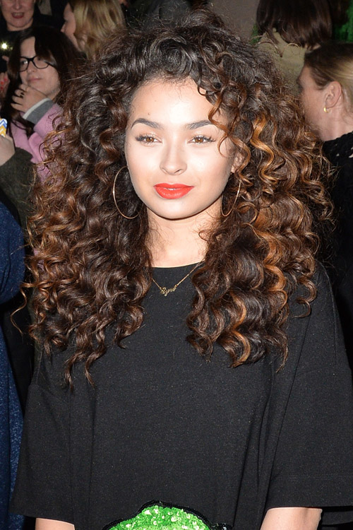 Ella Eyre Curly Dark Brown Afro, Peek-A-Boo Highlights Hairstyle ...