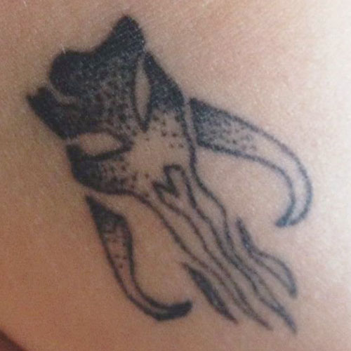Halsey Mask Elbow Tattoo | Steal Her Style