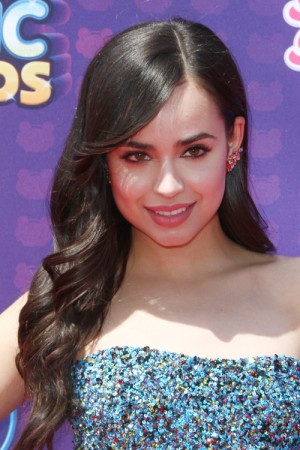 Sofia Carson Wavy Dark Brown Side Part Hairstyle | Steal Her Style