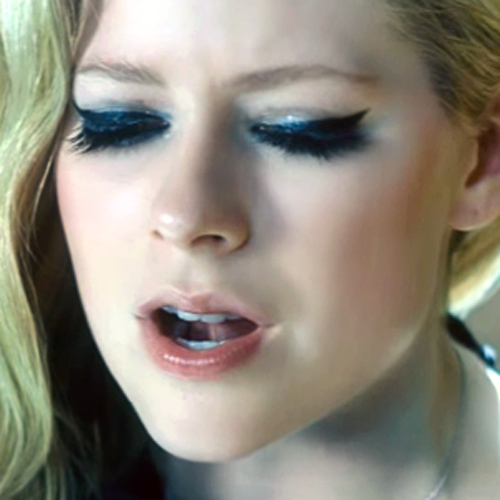 Avril Lavigne Makeup: Black Eyeshadow & Clear Lip Gloss | Steal Her Style