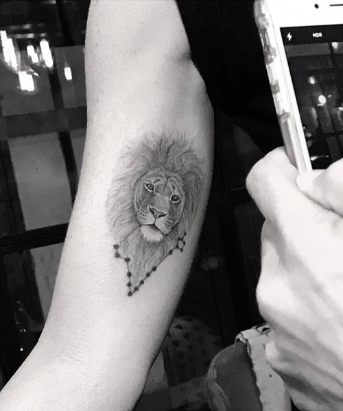 Catt Sadler Lion Bicep Tattoo | Steal Her Style