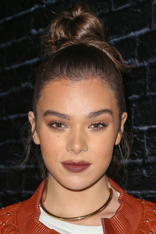 Hailee Steinfeld Straight Medium Brown Bun Hairstyle | Steal Her Style