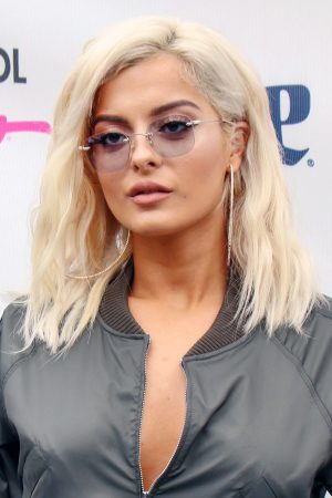 Bebe Rexha Wavy Platinum Blonde Choppy Layers Hairstyle | Steal Her Style