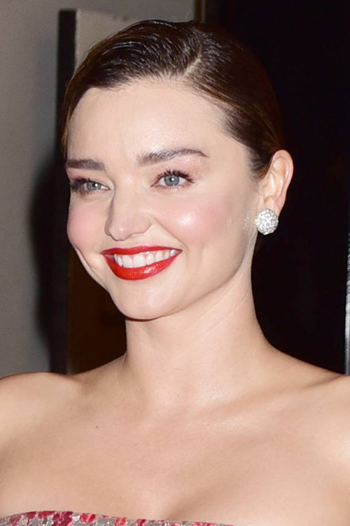 Miranda Kerr Straight Medium Brown Bun Hairstyle | Steal Her Style