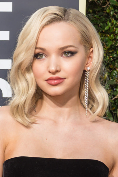Dove Cameron Wavy Platinum Blonde Dark Roots, Loose Waves Hairstyle ...