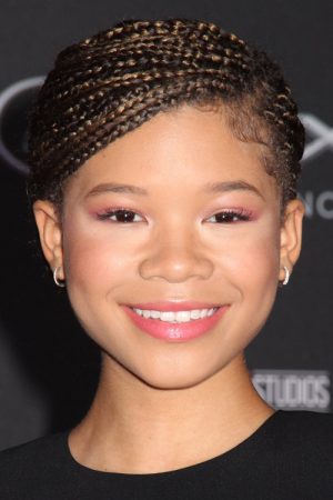 Storm Reid Curly Dark Brown Afro, All-Over Highlights, Bun, Mini Braids ...
