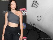 Noah Cyrus Smiley Face Wrist Tattoo | Steal Her Style